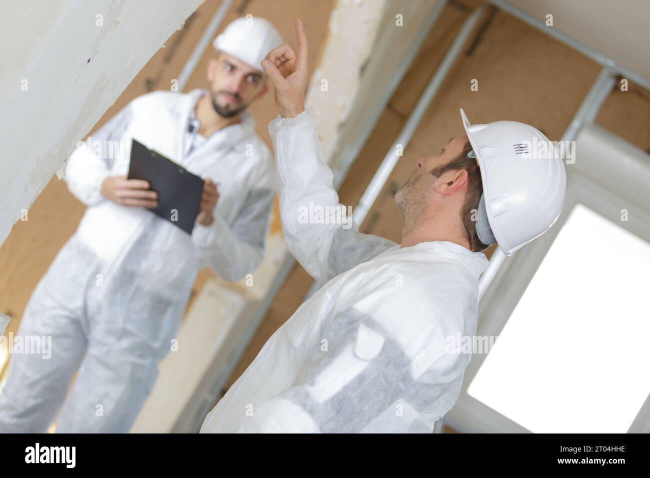 man is renovating a building Stock Photo - Alamy