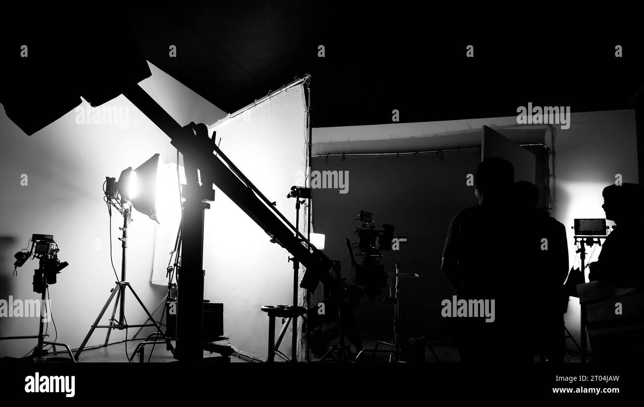 Silhouette images of making of or behind the scenes of video production ...