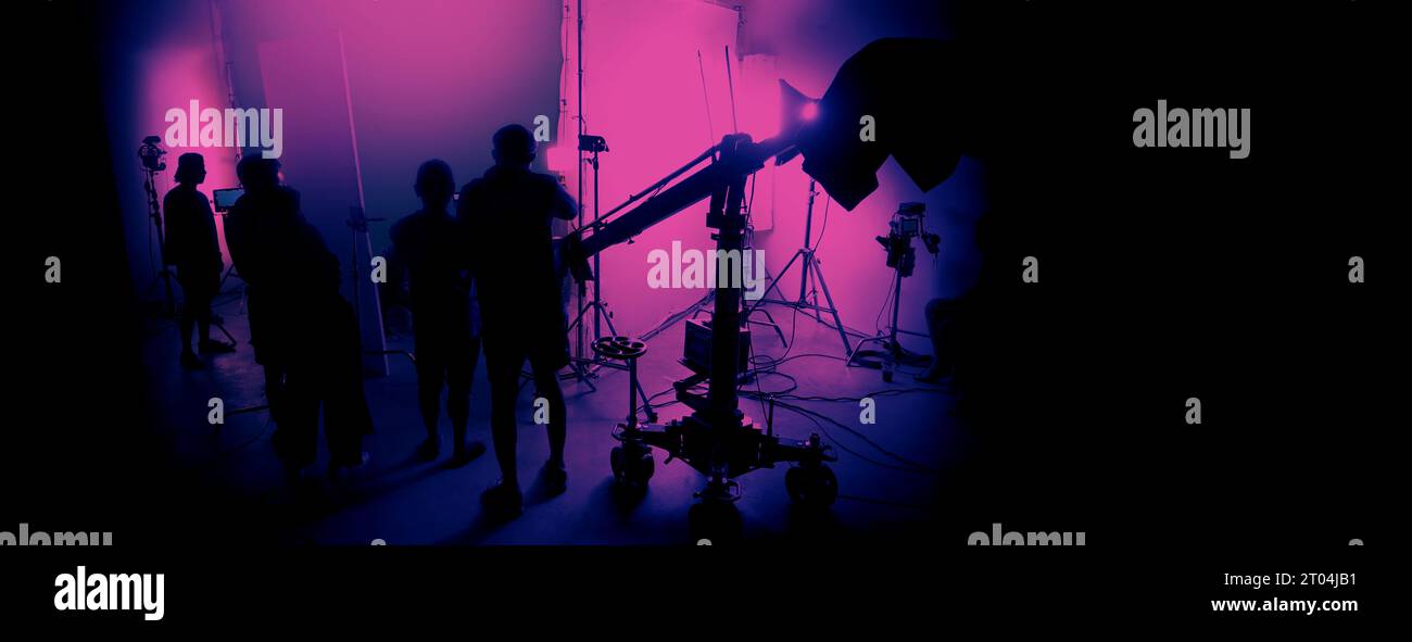 Silhouette images of making of or behind the scenes of video production ...
