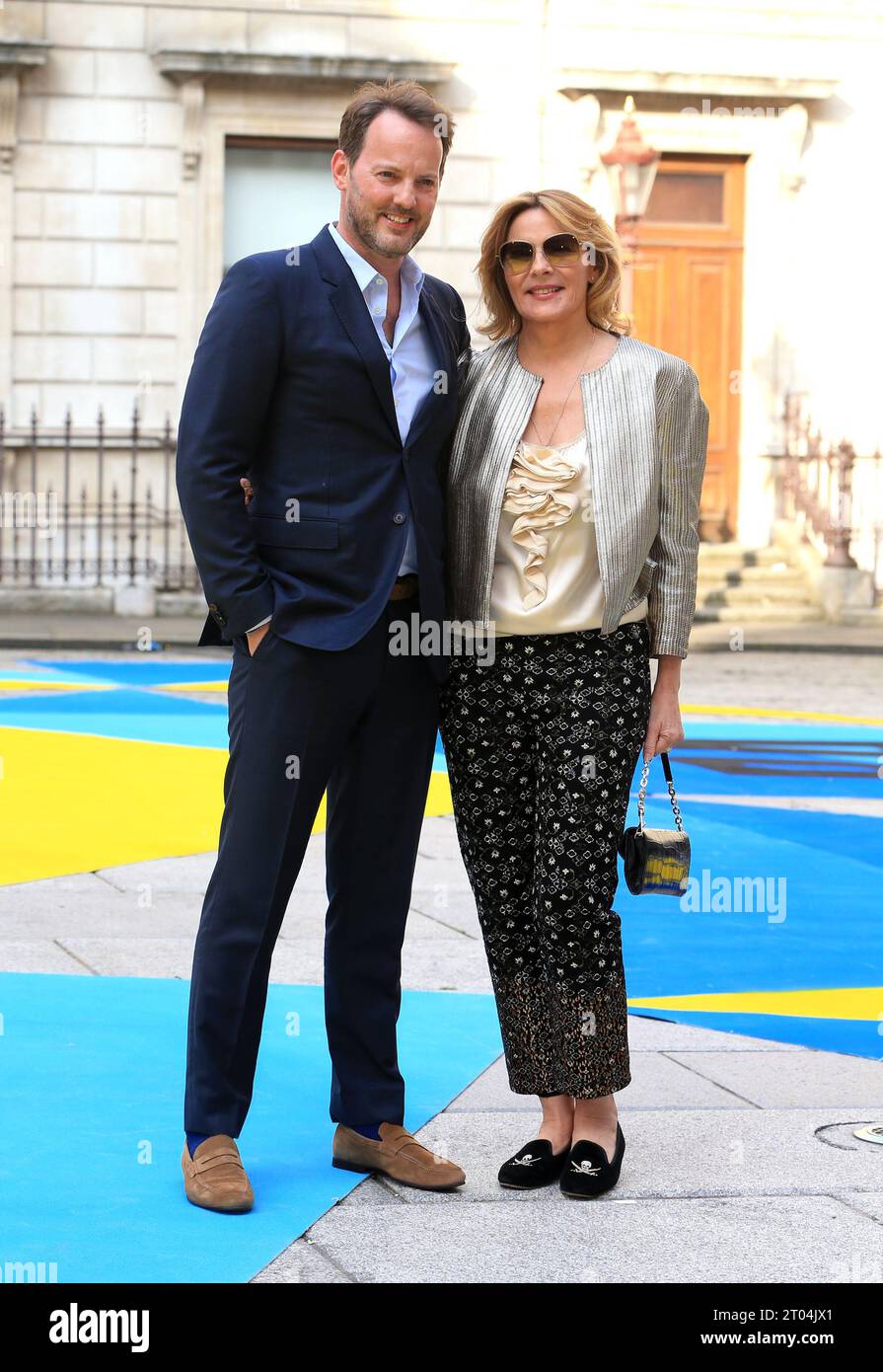 Russell Thomas (L) and Kim Cattrall attend the Royal Academy Of Arts ...