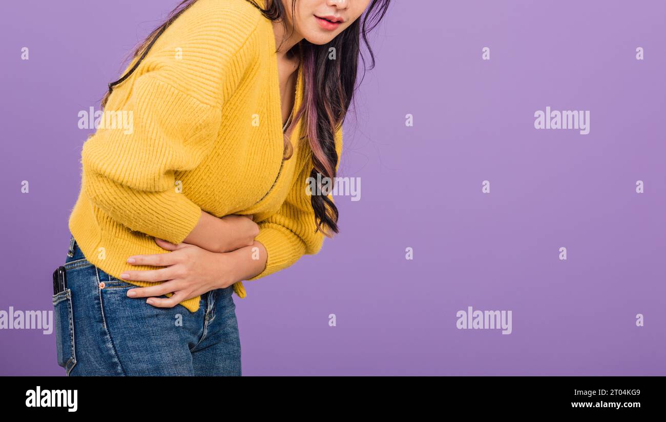 female abdominal pain suffering from stomach ache Stock Photo - Alamy