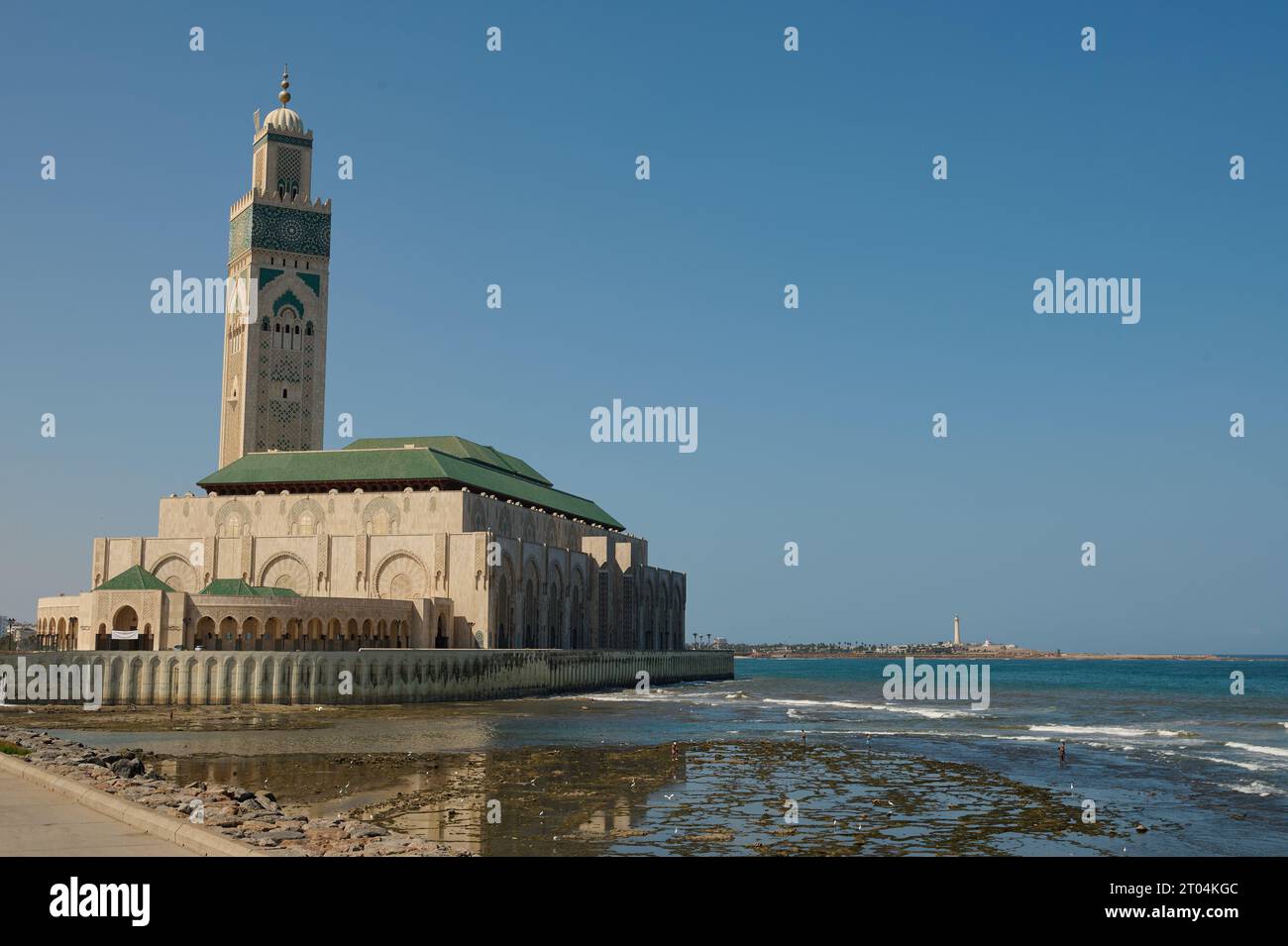 The beautiful Hassan II Mosque, located on the coast of Casablanca, is ...