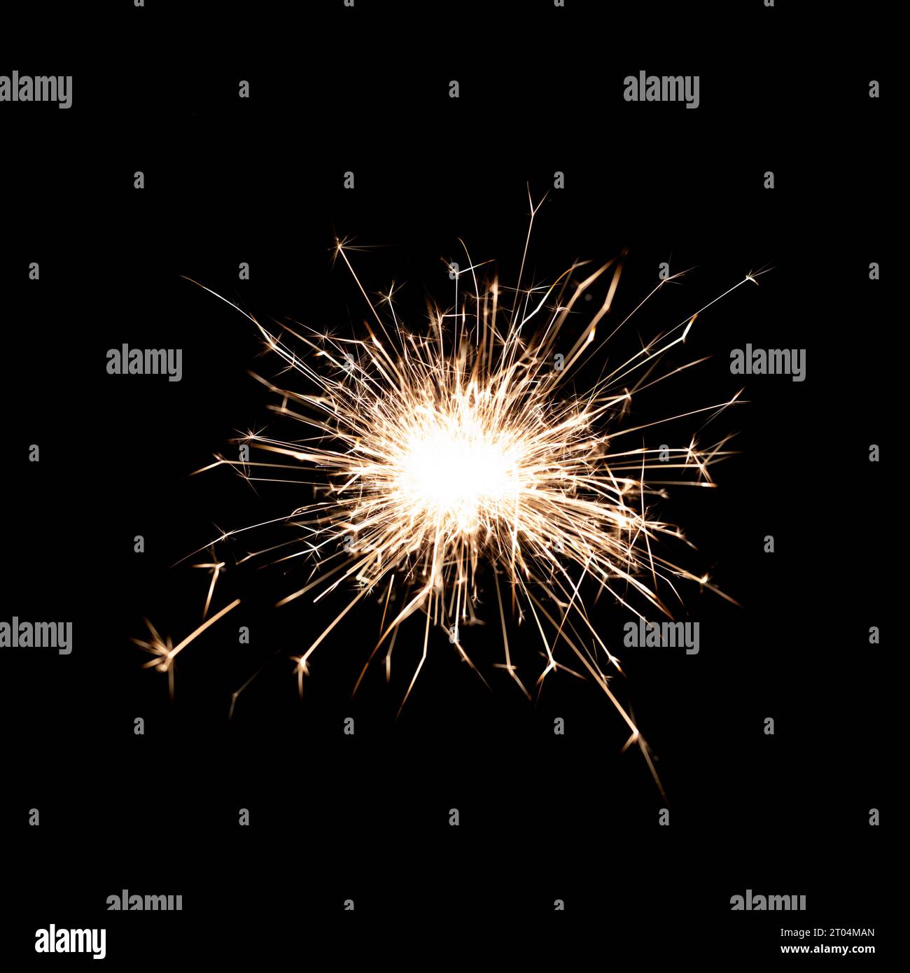 Sparkling burning sparkler on a black background. Isolated burning ...