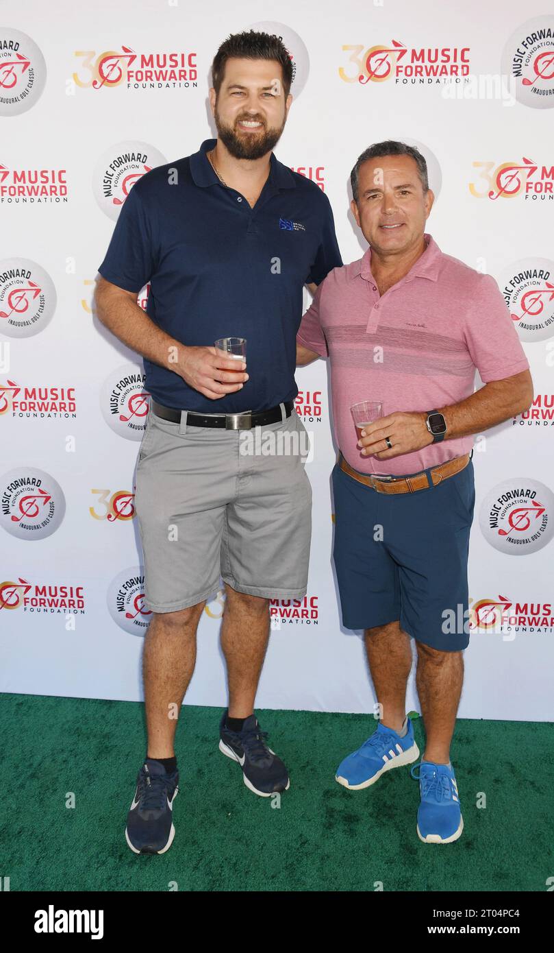 TARZANA, CALIFORNIA - OCTOBER 02: (L-R) Chris Mark and Mike Brascia ...