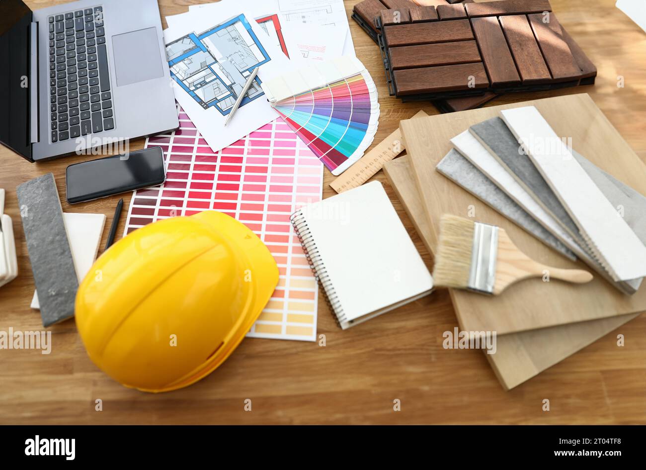 Overhead view of architect workplace drawing floor plan of modern house ...