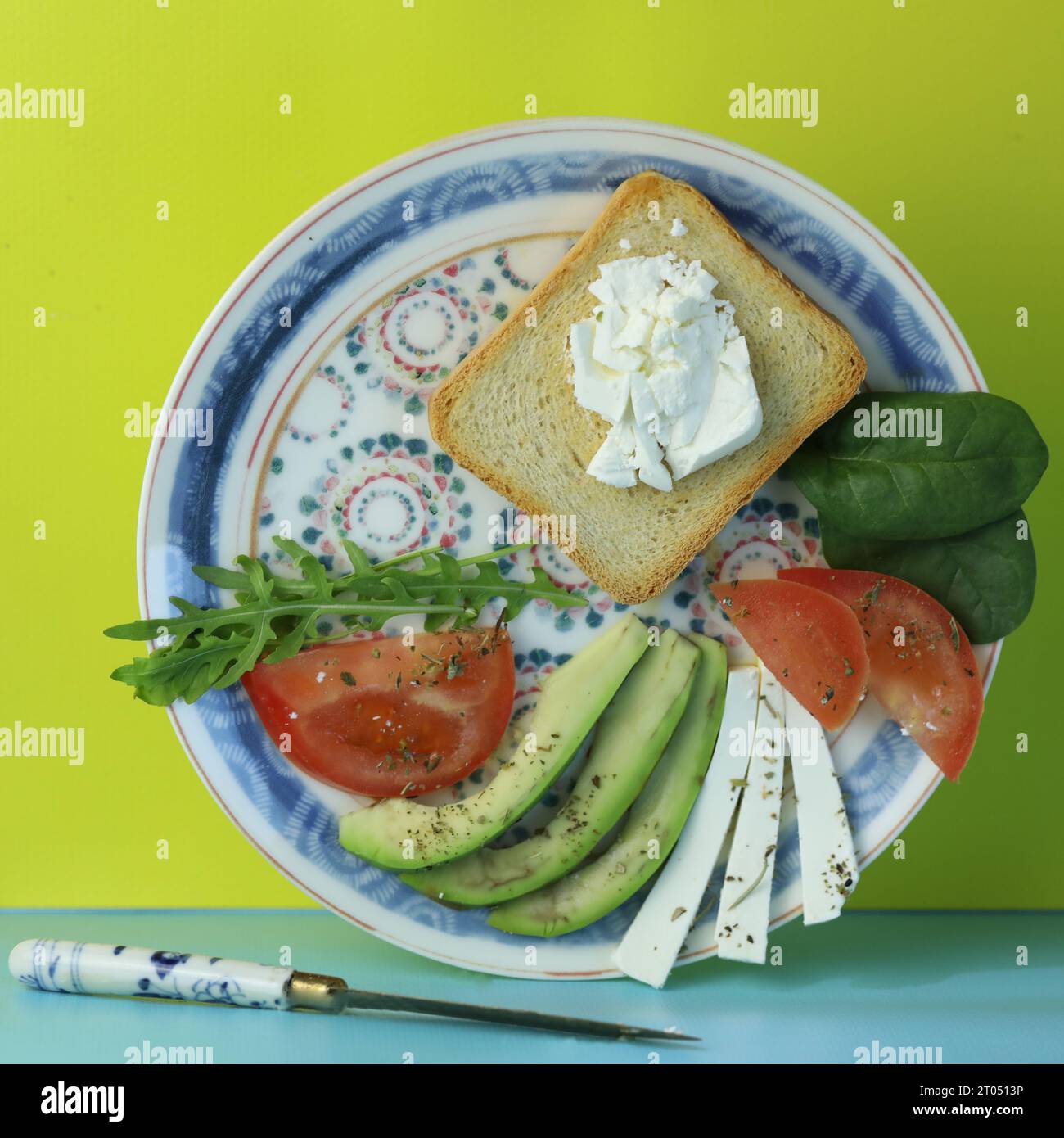 Diet toasts with cheese, salad, avocado and tomato. Healthy organic ...