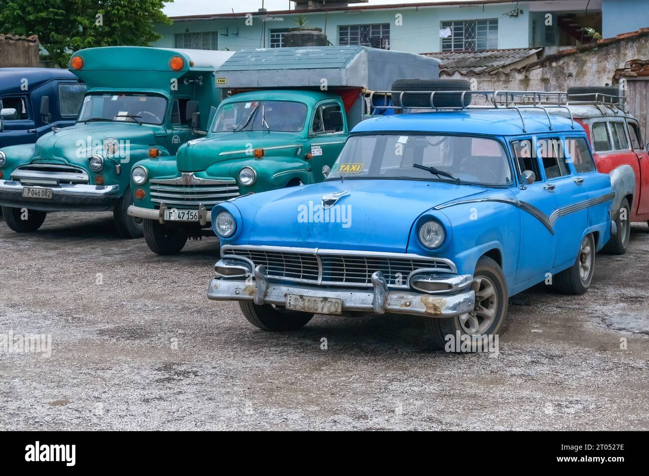 Group of old obsolete American vehicles in a passenger terminal. The ...