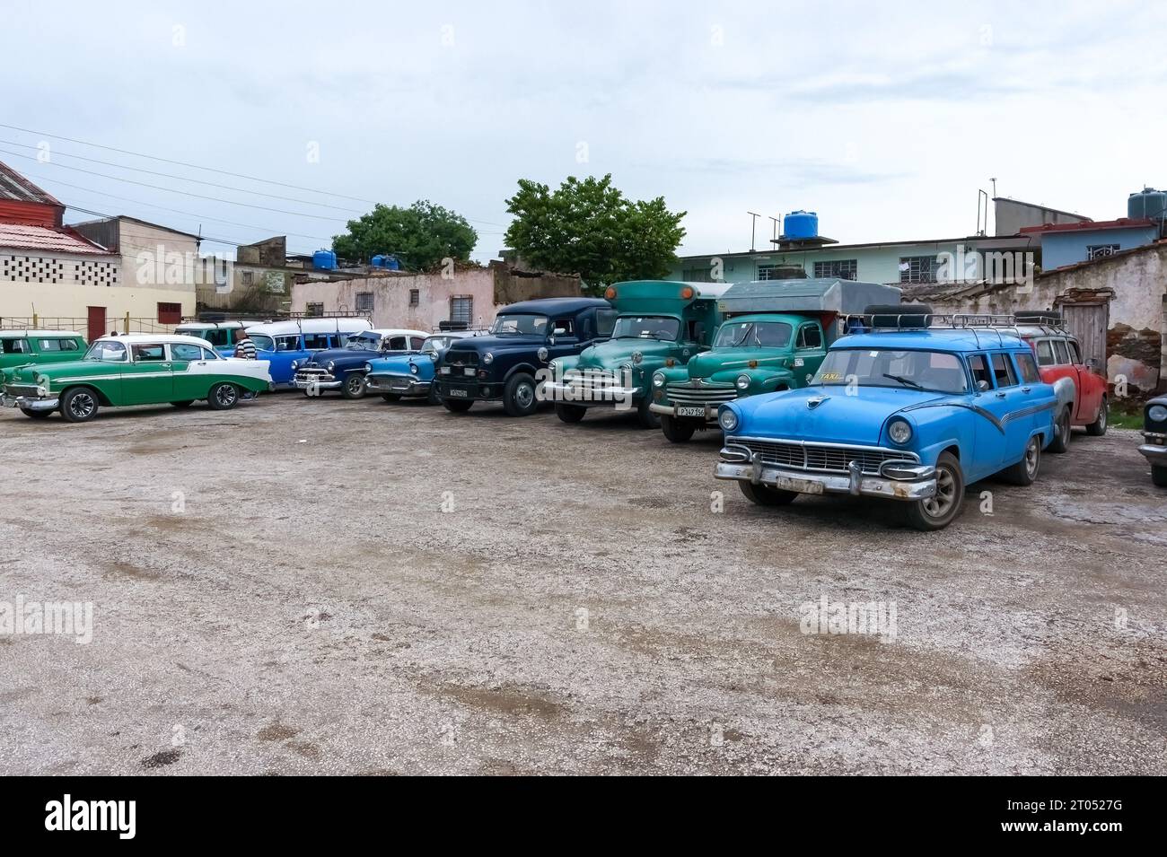 Group of old obsolete American vehicles in a passenger terminal. The ...
