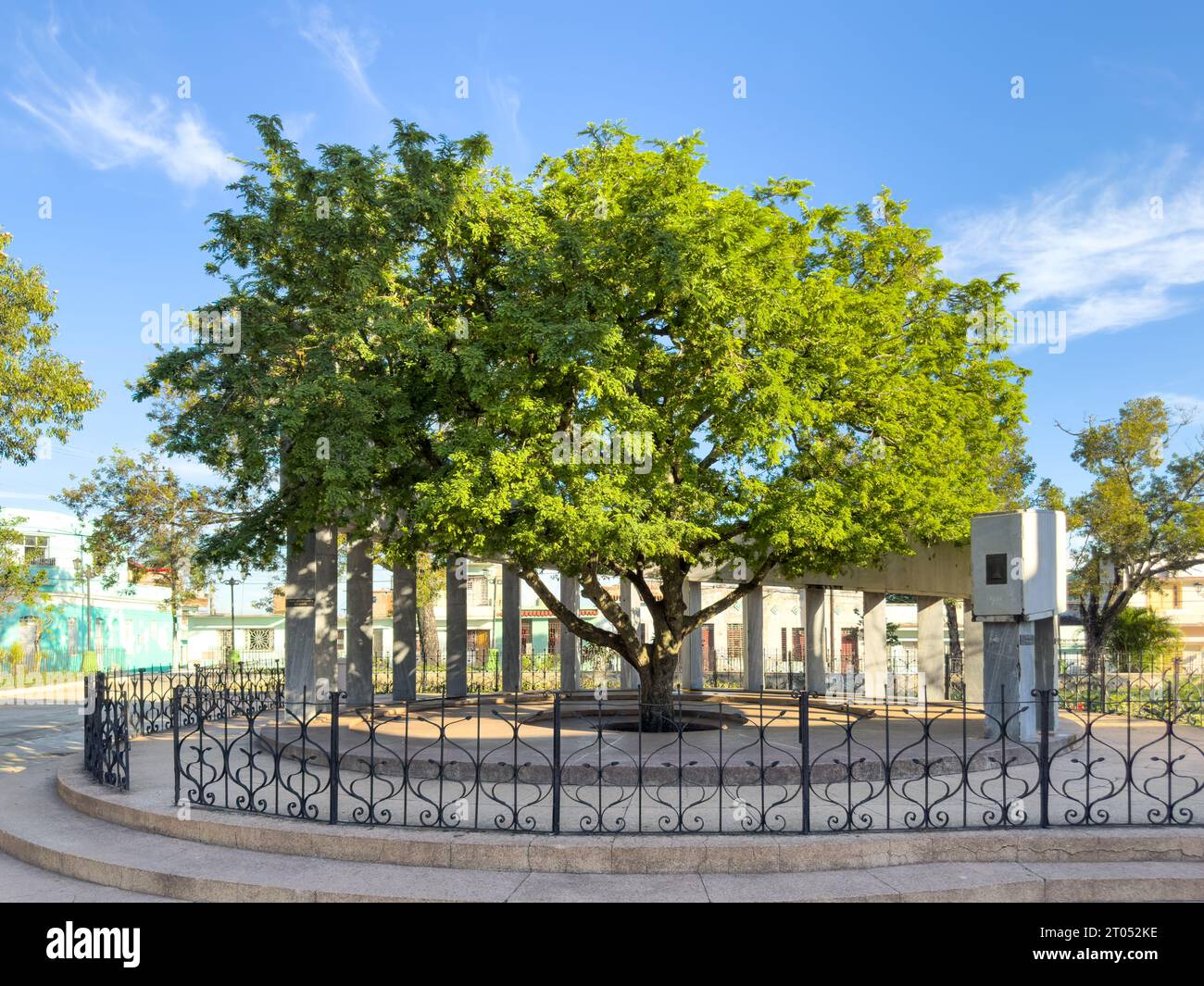 A Ceiba tree and a marble colonnade monument mark the place where the ...