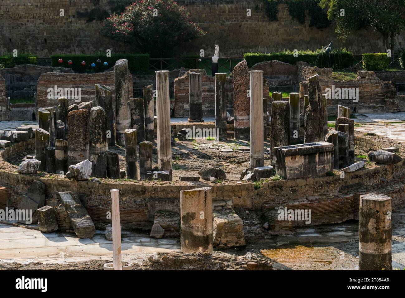Roman ruins of the temple of Serapis in the city of Pozzuoli, in the ...
