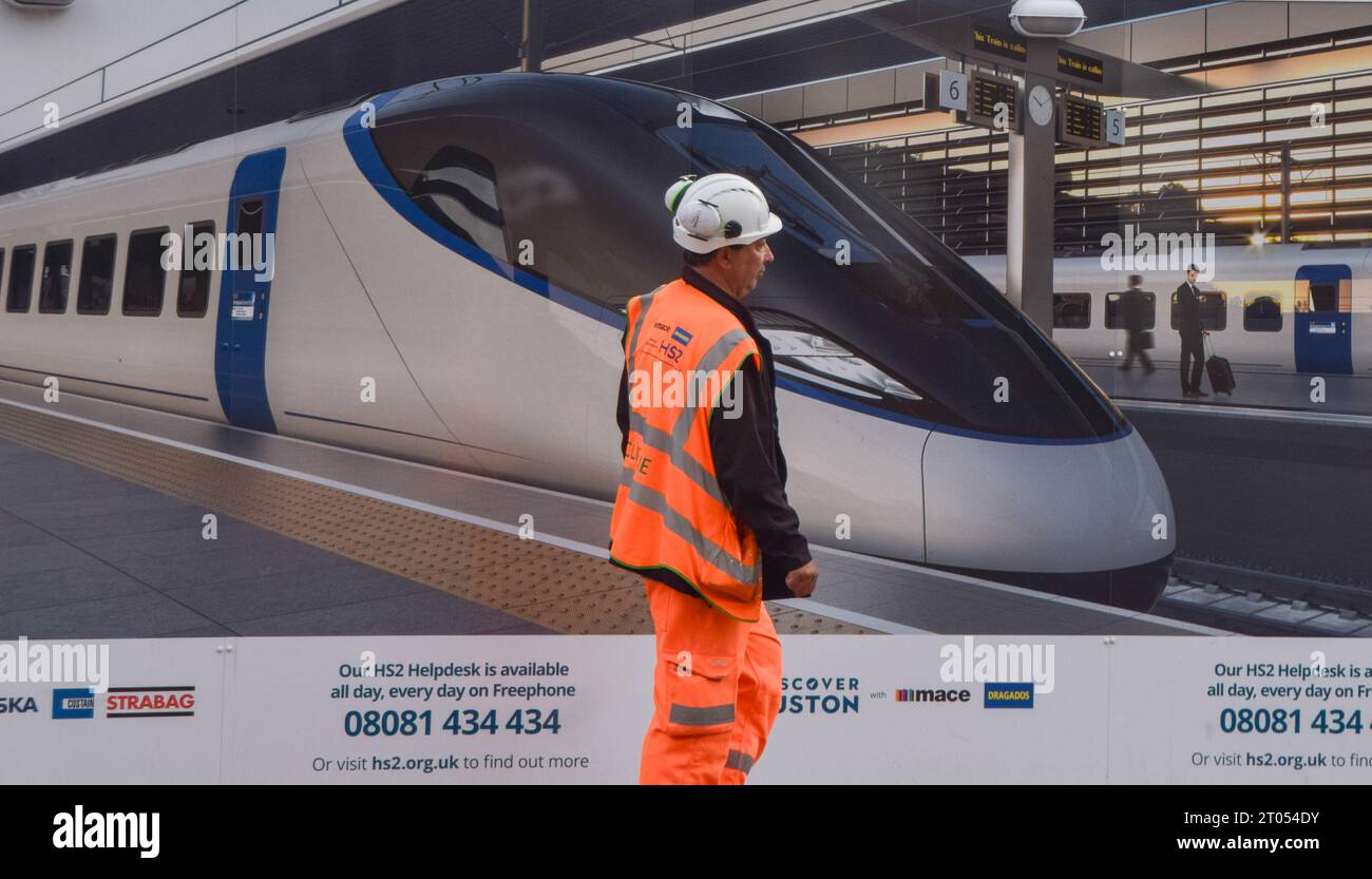 London, England, UK. 4th Oct, 2023. A worker walks past the HS2 ...