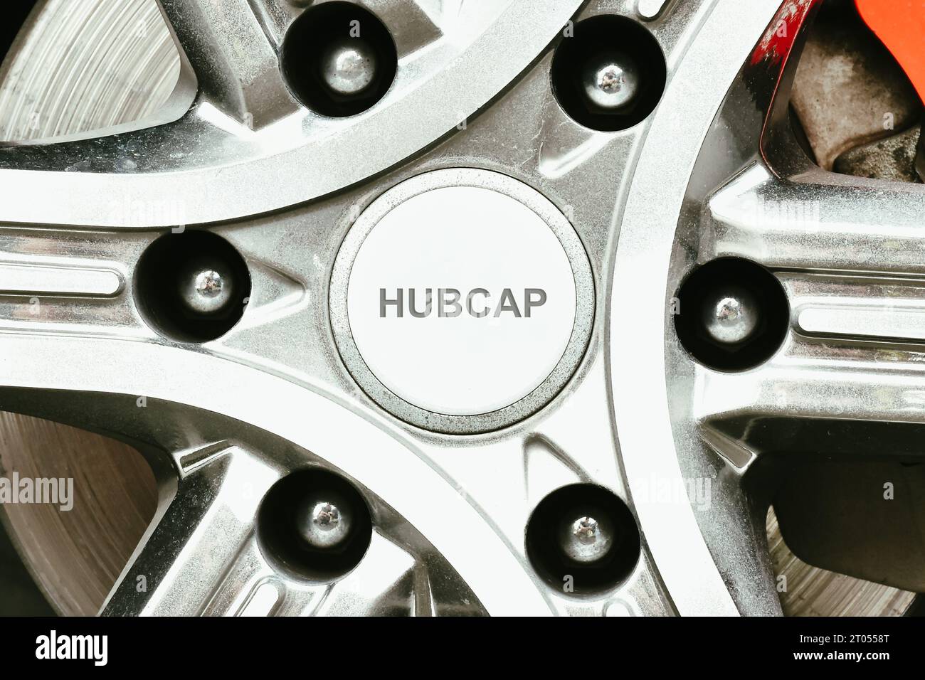 Close up a mini hubcap cover of car wheel, hubcap cover in a wheel hub ...