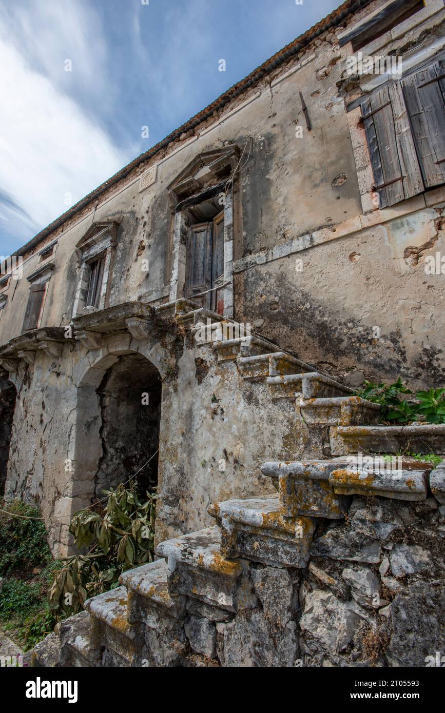 old derelict greek farmhouse in a poor state of repair with crumbling ...