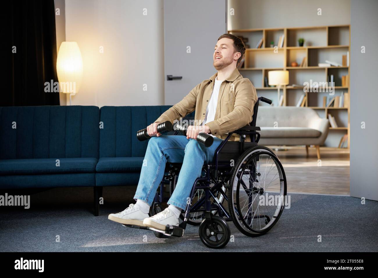 Physical rehabilitation for disabled people. Happy guy in wheelchair ...