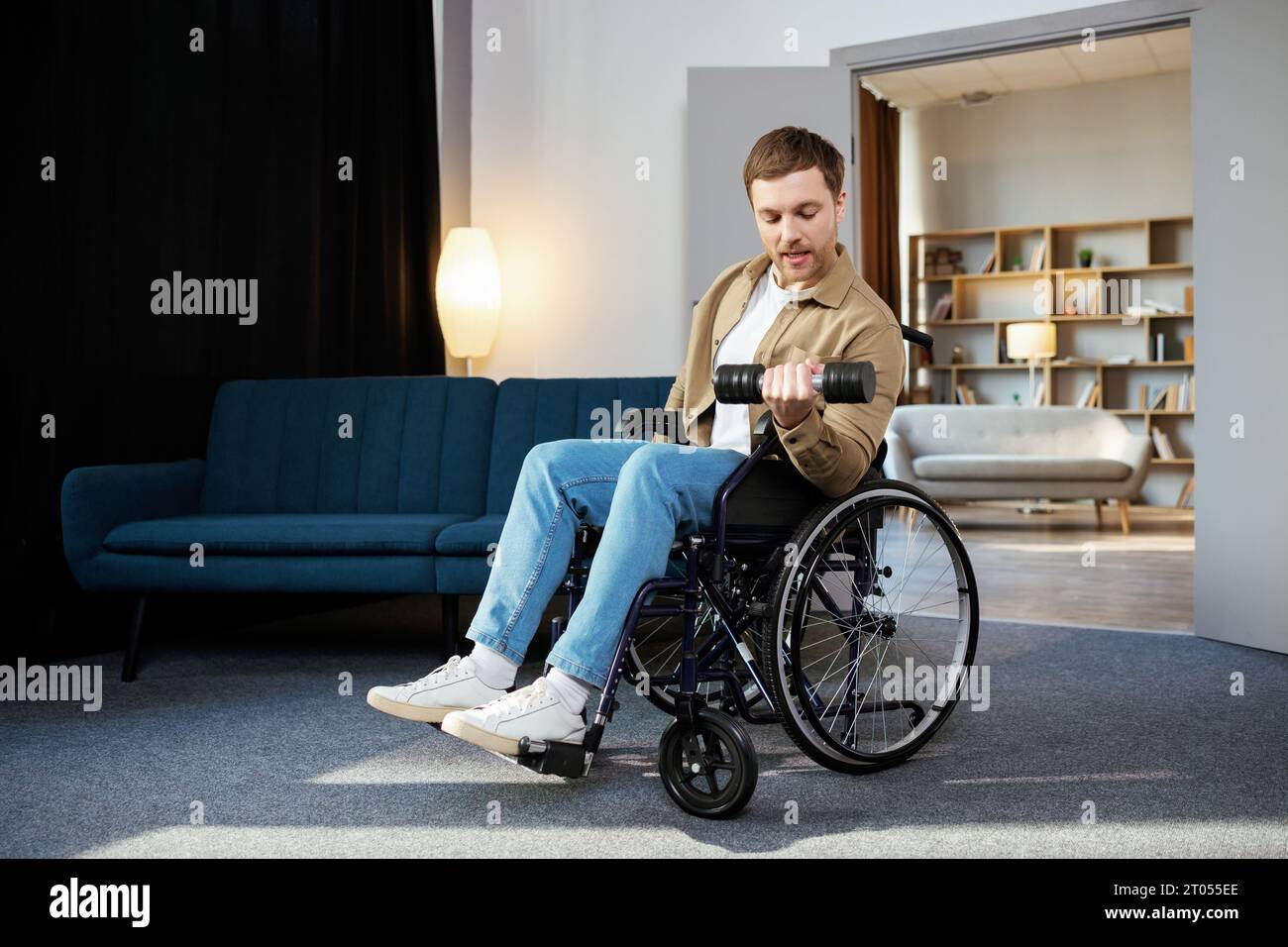 Physical rehabilitation for disabled people. Happy guy in wheelchair ...
