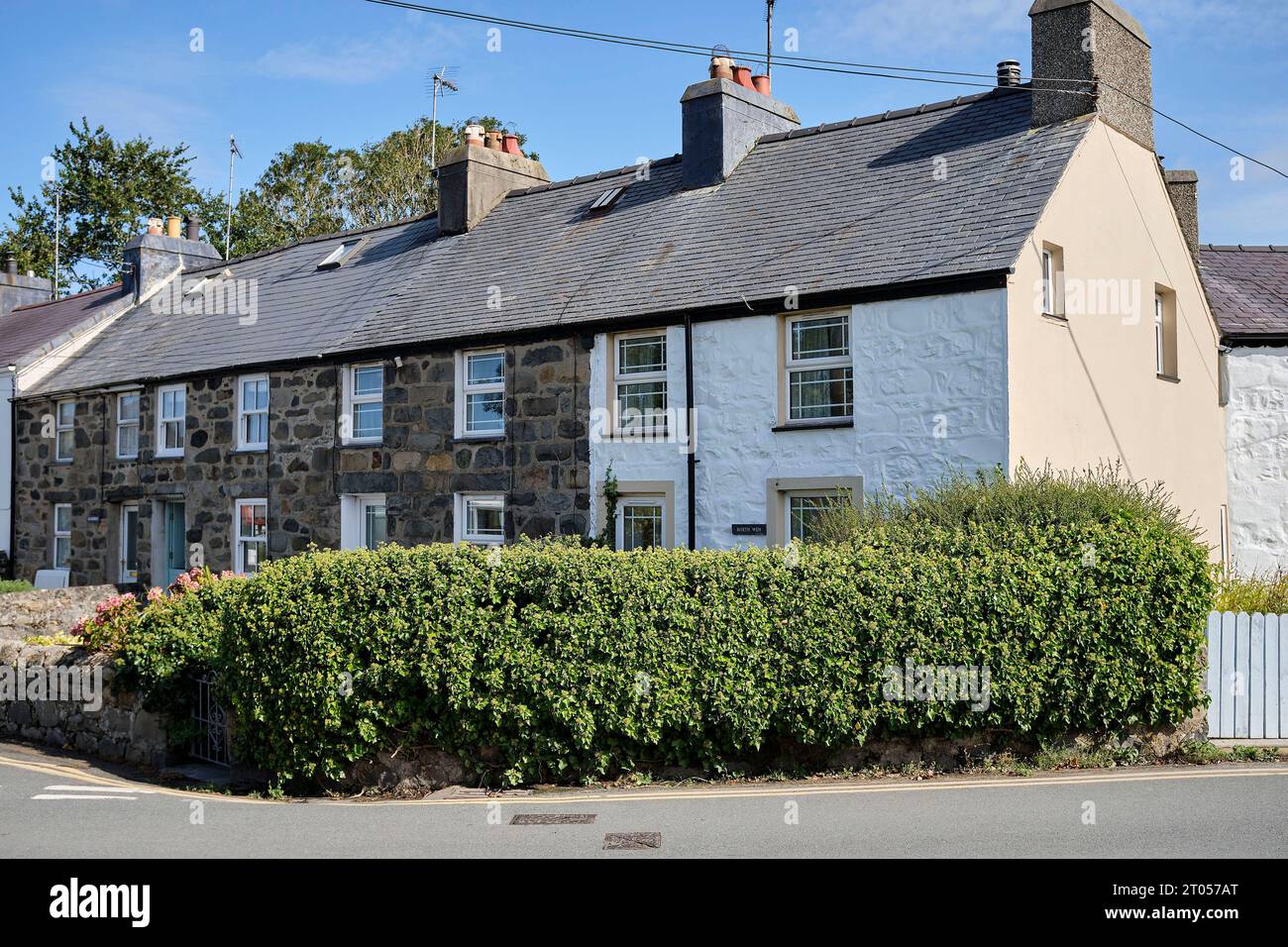 Old cottages, now used as holiday lets, in the coastal community of ...