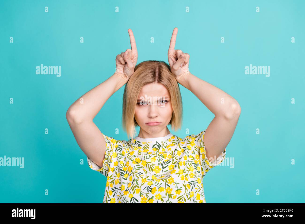 Photo of bully furious girl dressed yellow print t-shirt showing ...