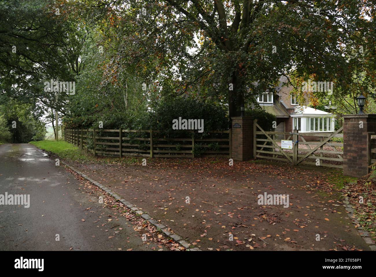 A padlock on the gates of a house on Heath Road, Whitmore Heath in the ...