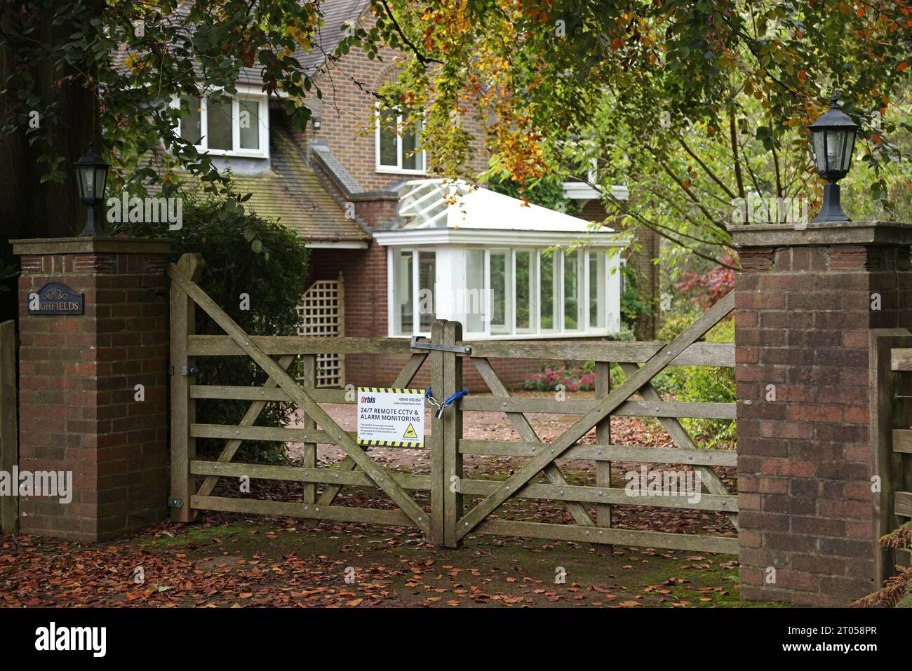 A padlock on the gates of a house on Heath Road, Whitmore Heath in the ...