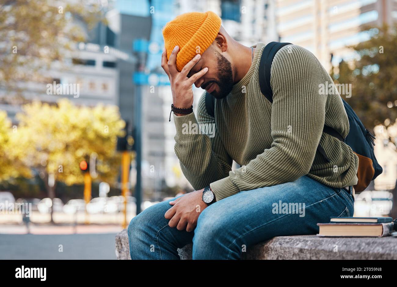 Stress, headache and student outdoor in college, campus or city with ...