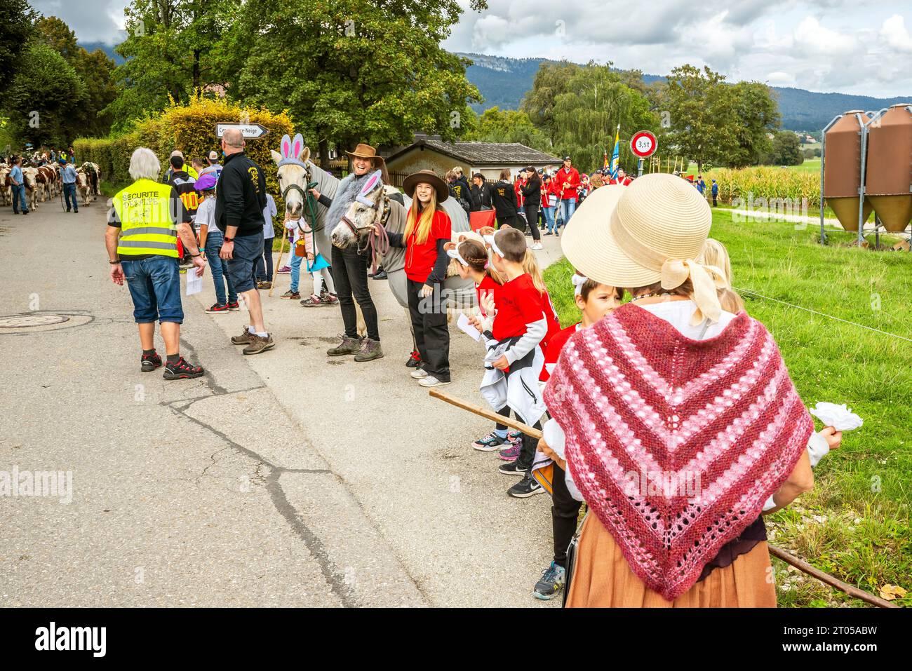Villagers dressed in traditional costumes proudly take part in the ...