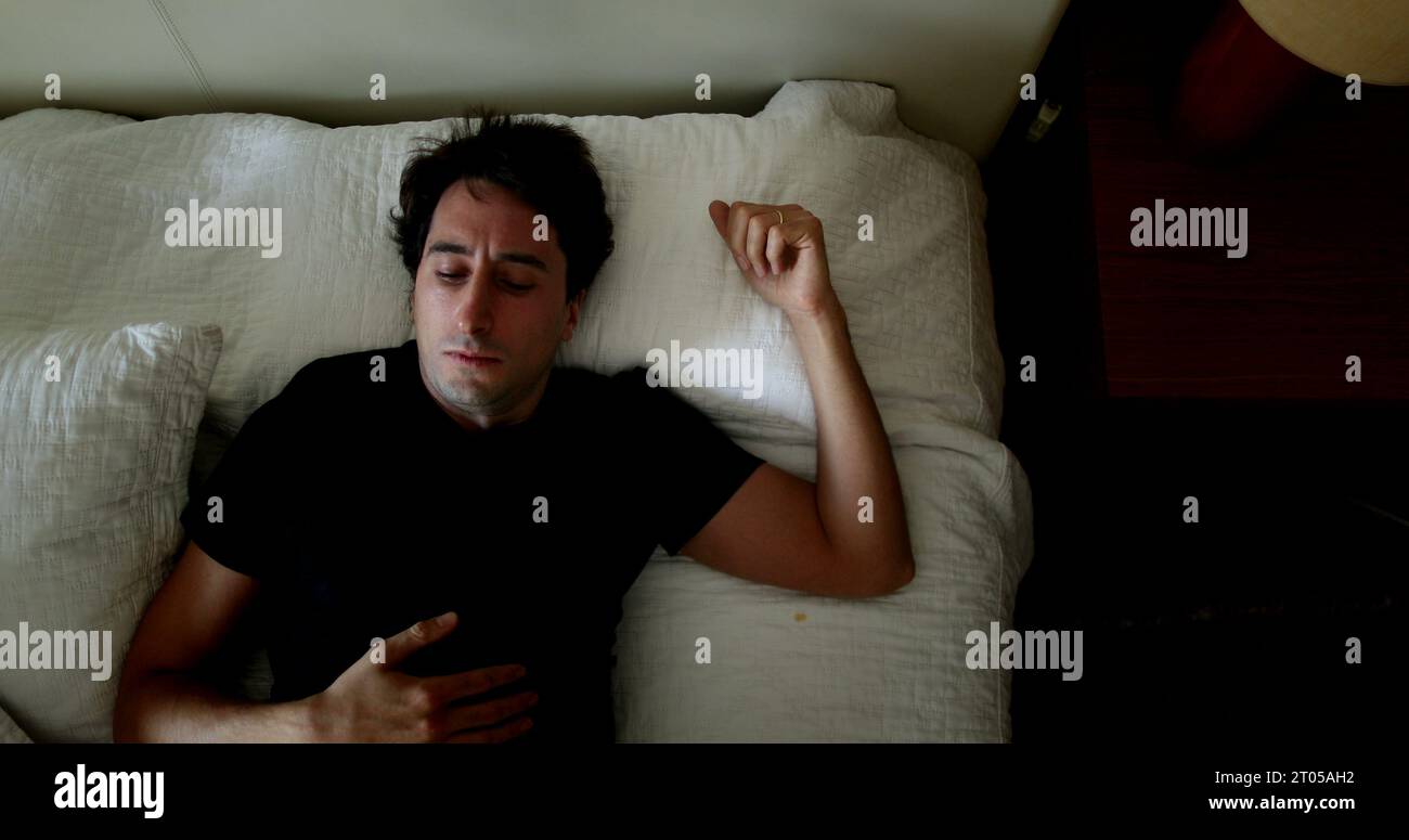 Person getting out bed night hi-res stock photography and images - Alamy