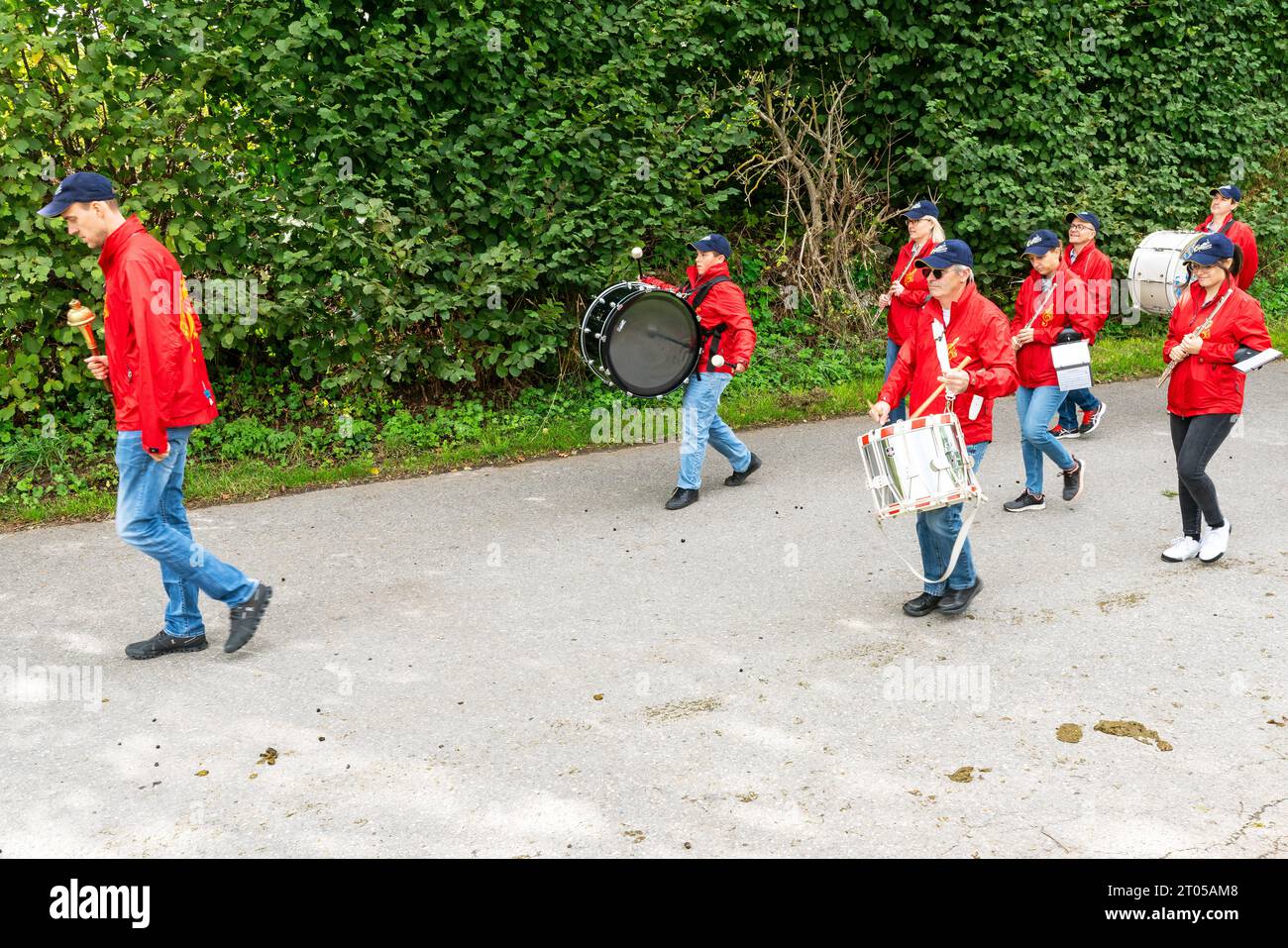 Villagers dressed in traditional costumes proudly take part in the ...