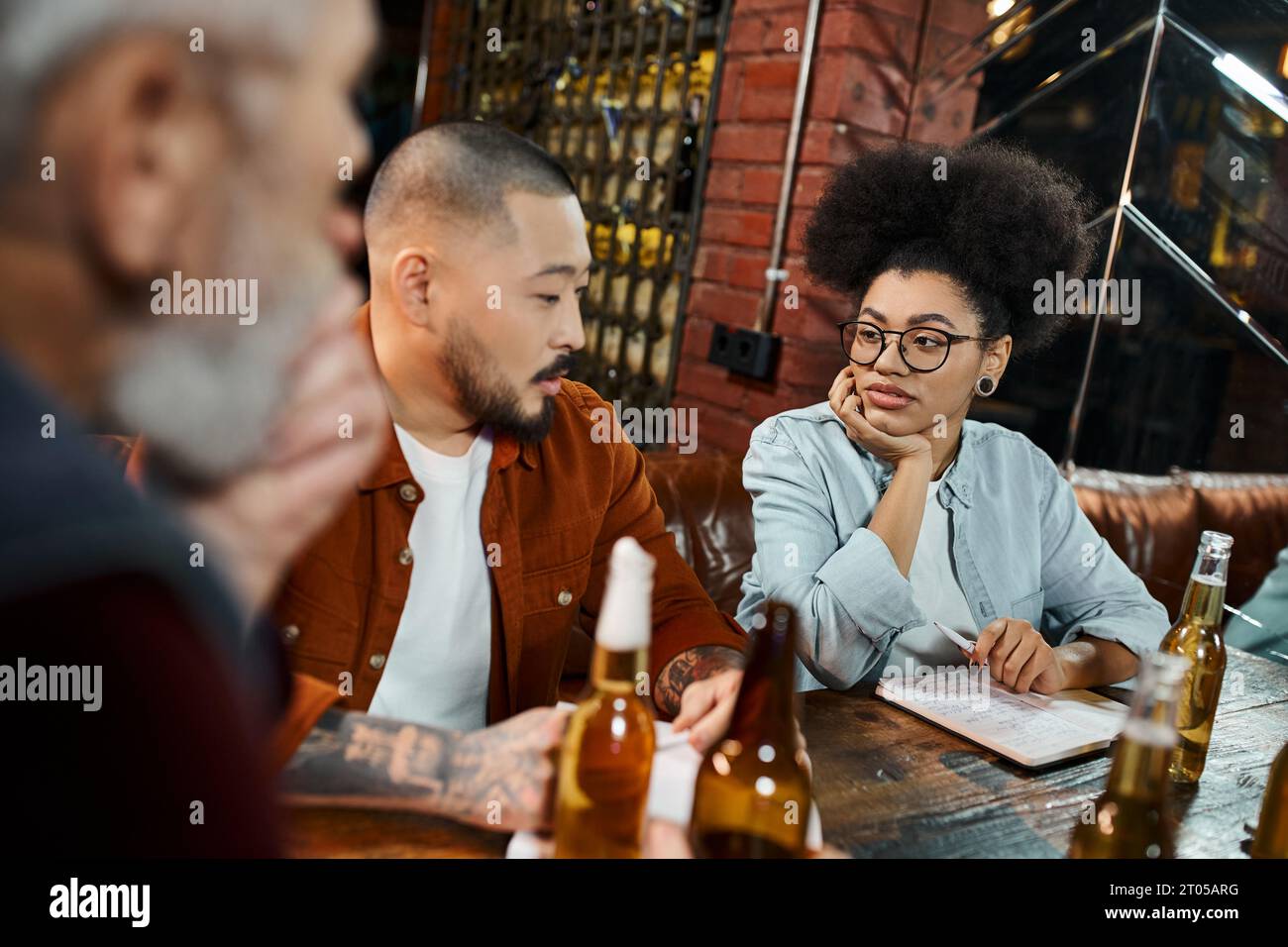 african american woman listening to multiethnic colleagues discussing ...