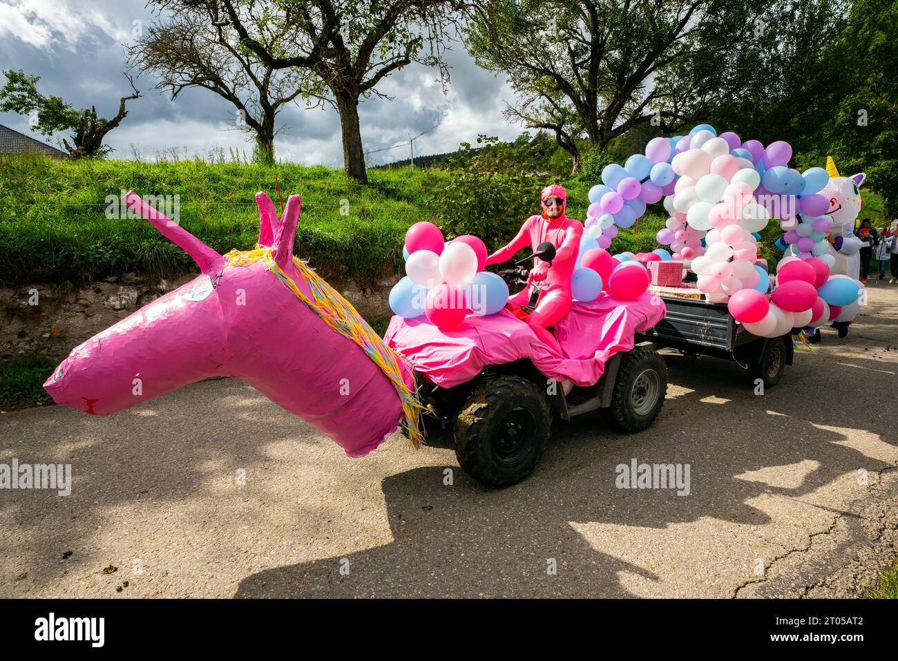 Villagers dressed in traditional costumes proudly take part in the ...