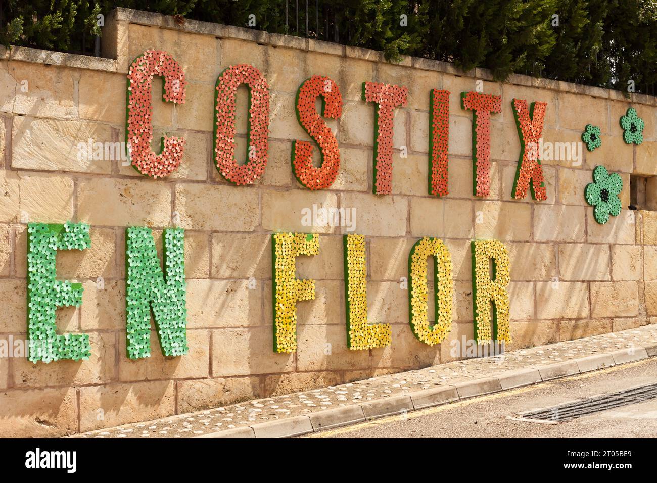 Letters made with flowers that make up the name of the event "Costitx ...