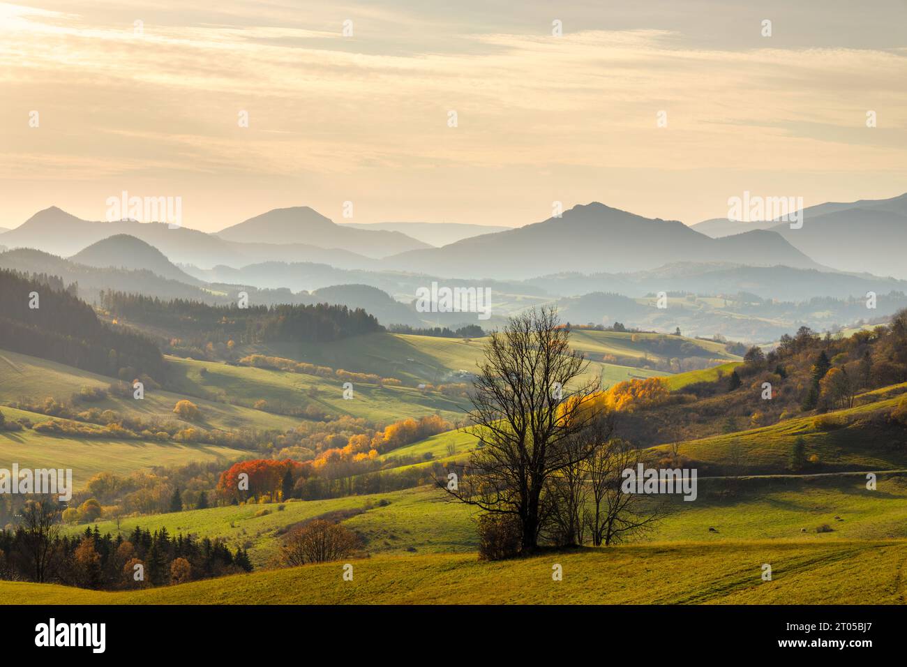Autumn sunny rural landscape with mountains at background. The Orava ...