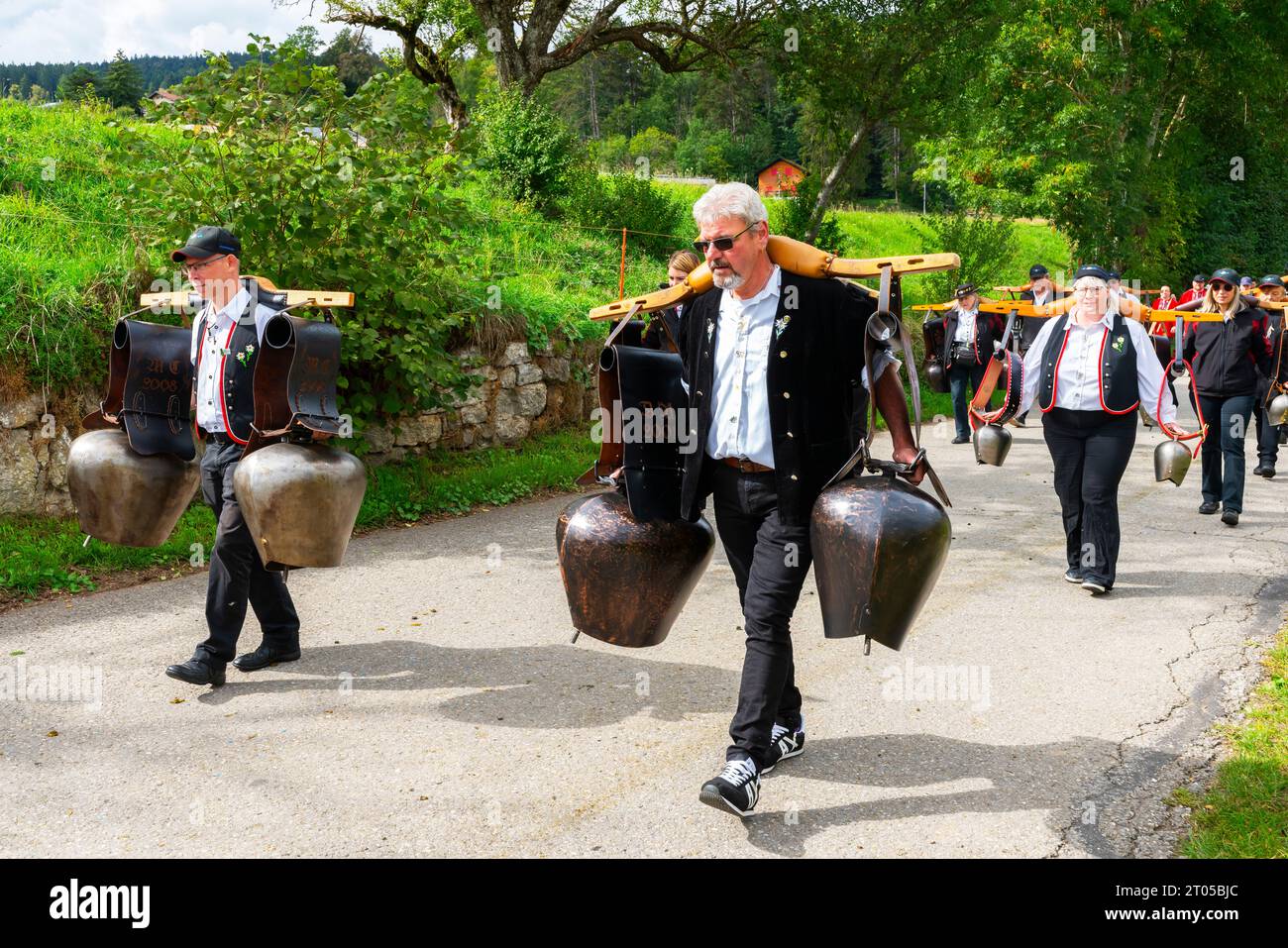Villagers dressed in traditional costumes proudly take part in the ...