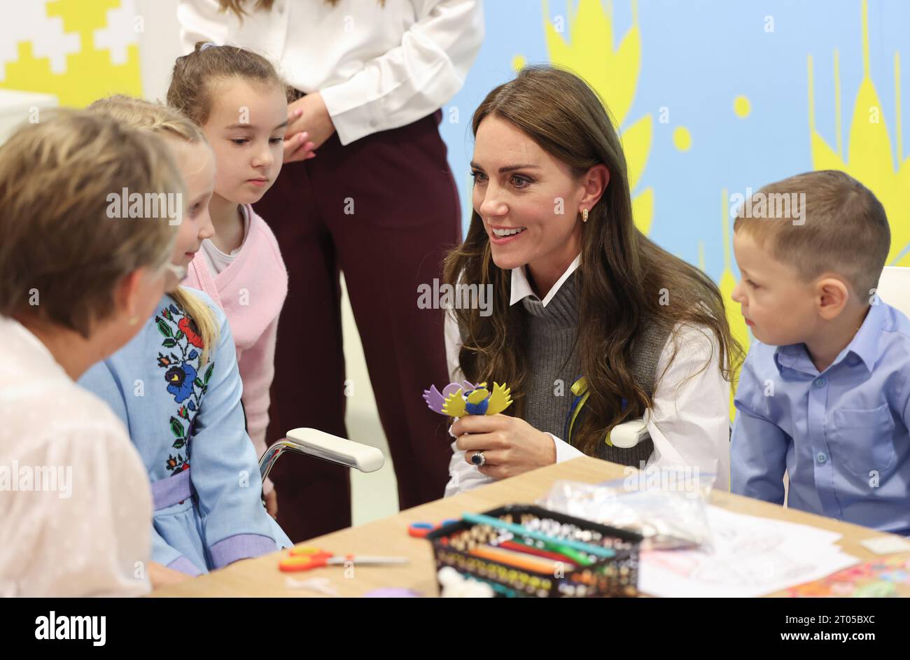 The Princess of Wales speaks with young children at an arts and crafts ...