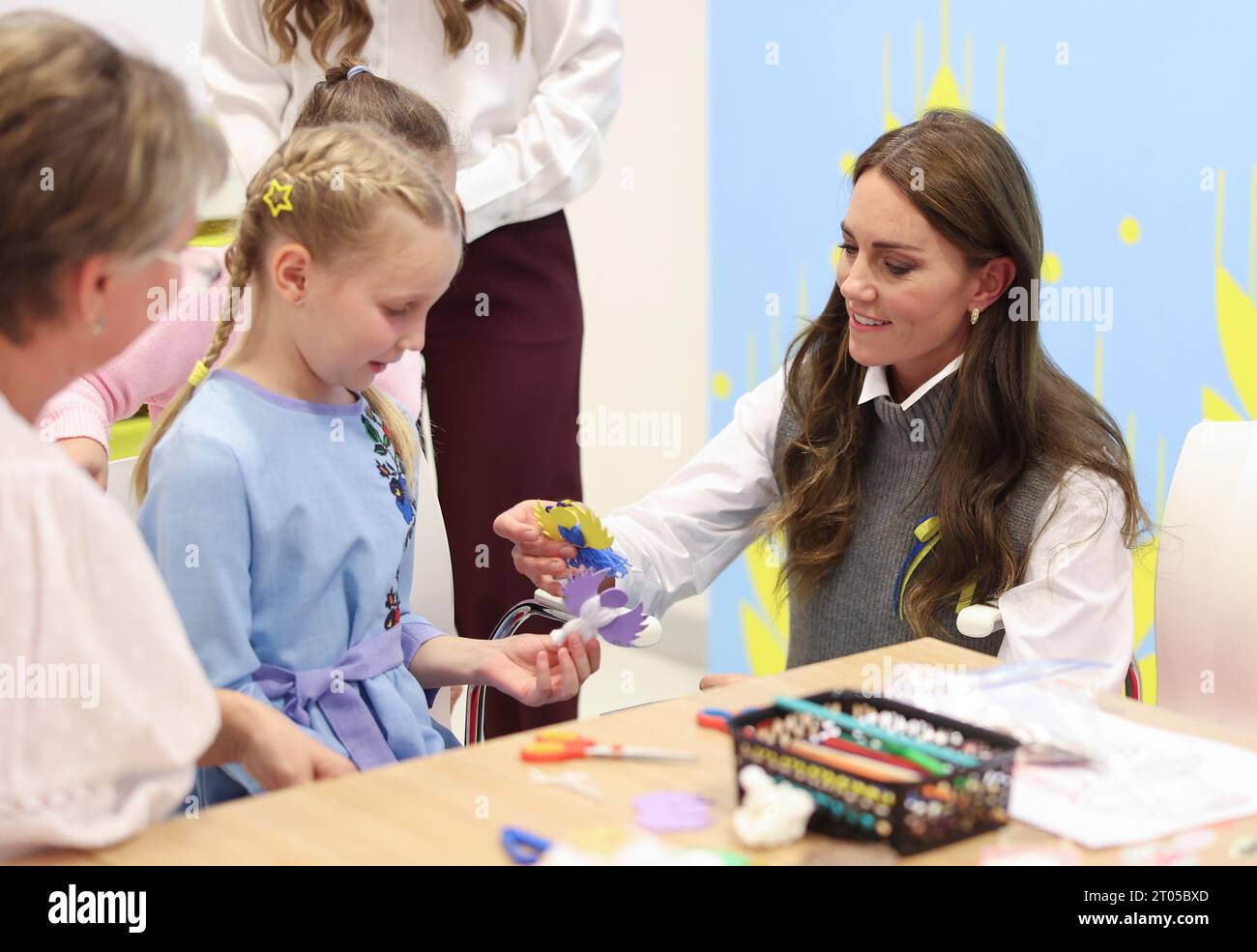 The Princess of Wales speaks with young children at an arts and crafts ...