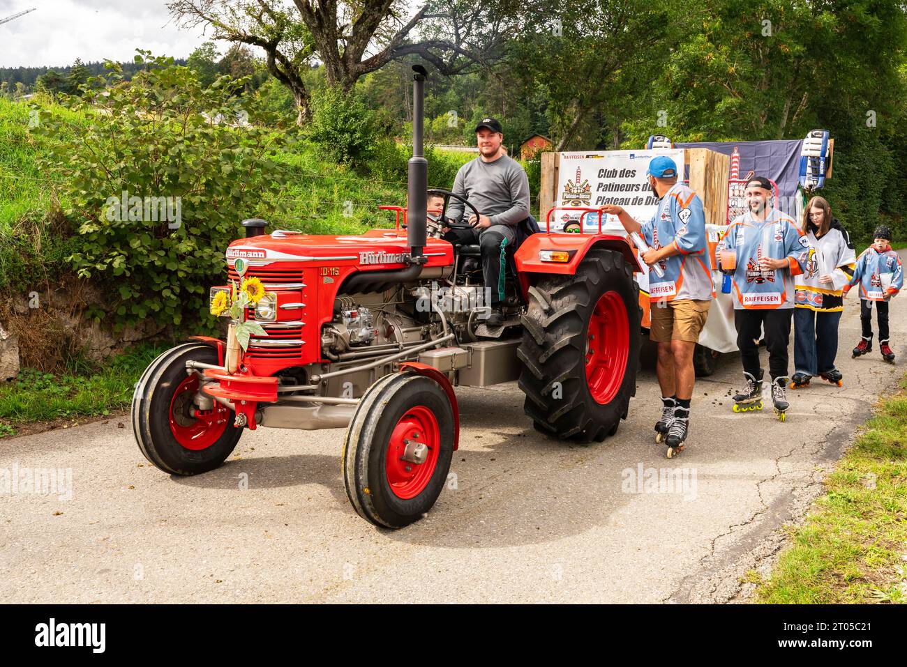 Villagers dressed in traditional costumes proudly take part in the ...