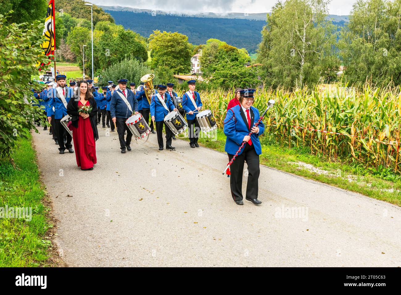 Villagers dressed in traditional costumes proudly take part in the ...