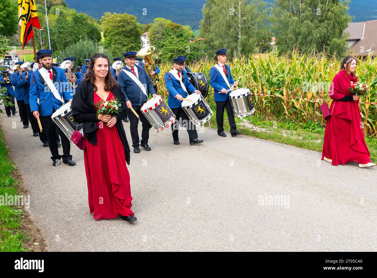Villagers dressed in traditional costumes proudly take part in the ...