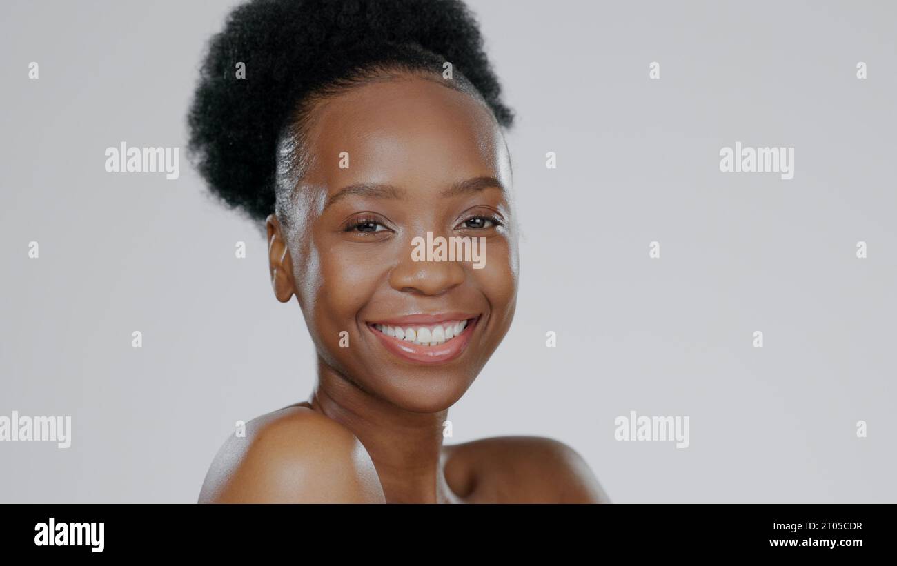 Face, skincare and beauty of happy black woman in studio isolated on a gray background mockup ...