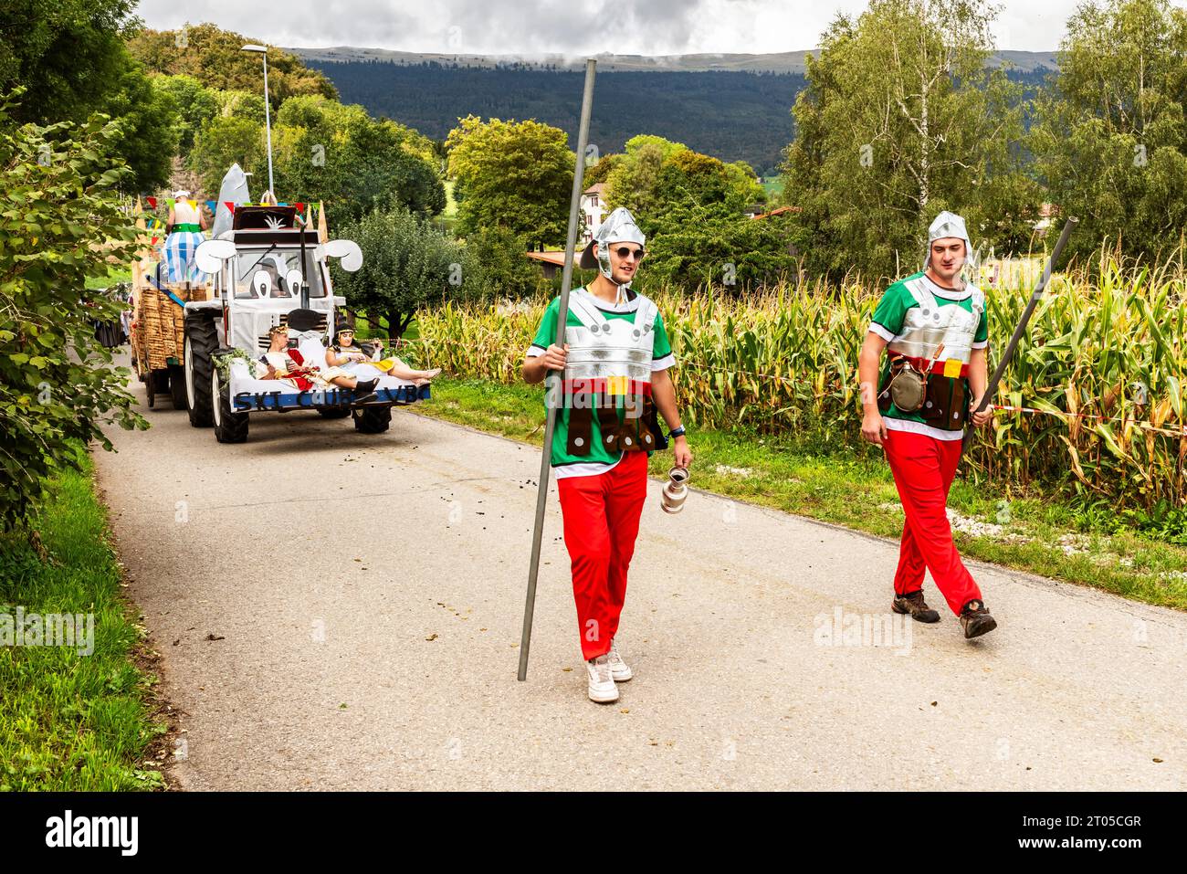 Villagers dressed in traditional costumes proudly take part in the ...