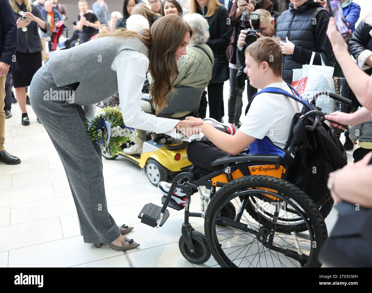 The Princess of Wales speaks with a well-wisher in a wheelchair during ...
