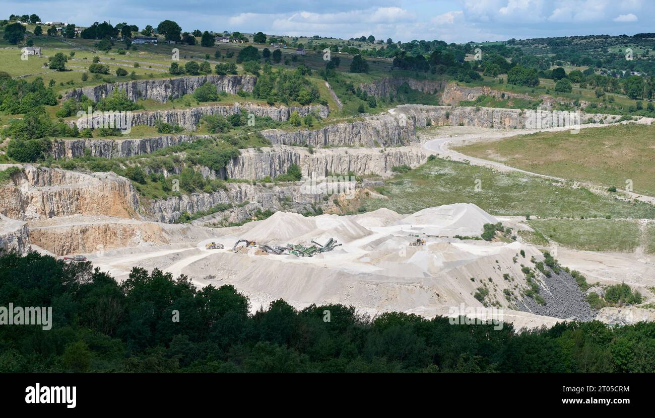 Quarrying of limestone from Dene Quarry, Cromford, Derbyshire Stock ...