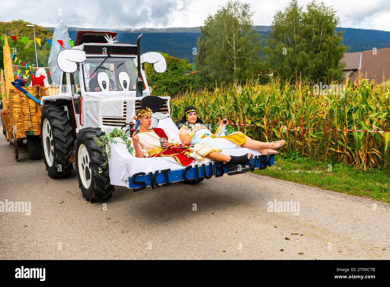 Villagers dressed in traditional costumes proudly take part in the ...