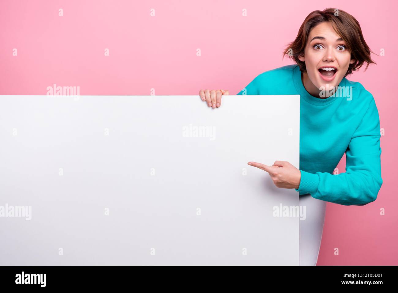 Portrait of astonished lady wear stylish teal clothes arm direct empty space buy low price ...