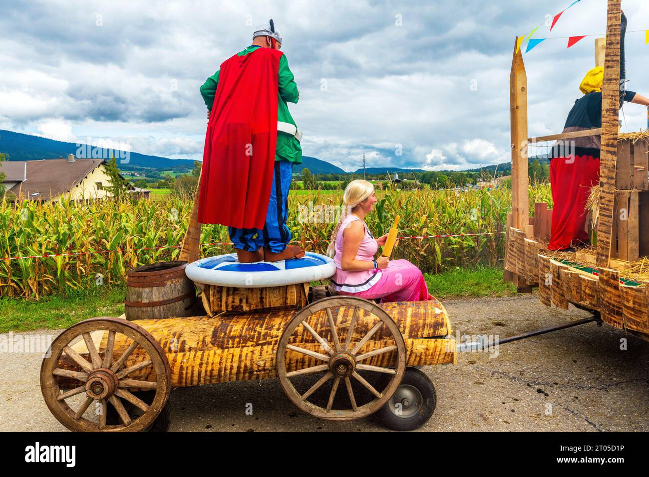 Villagers dressed in traditional costumes proudly take part in the ...