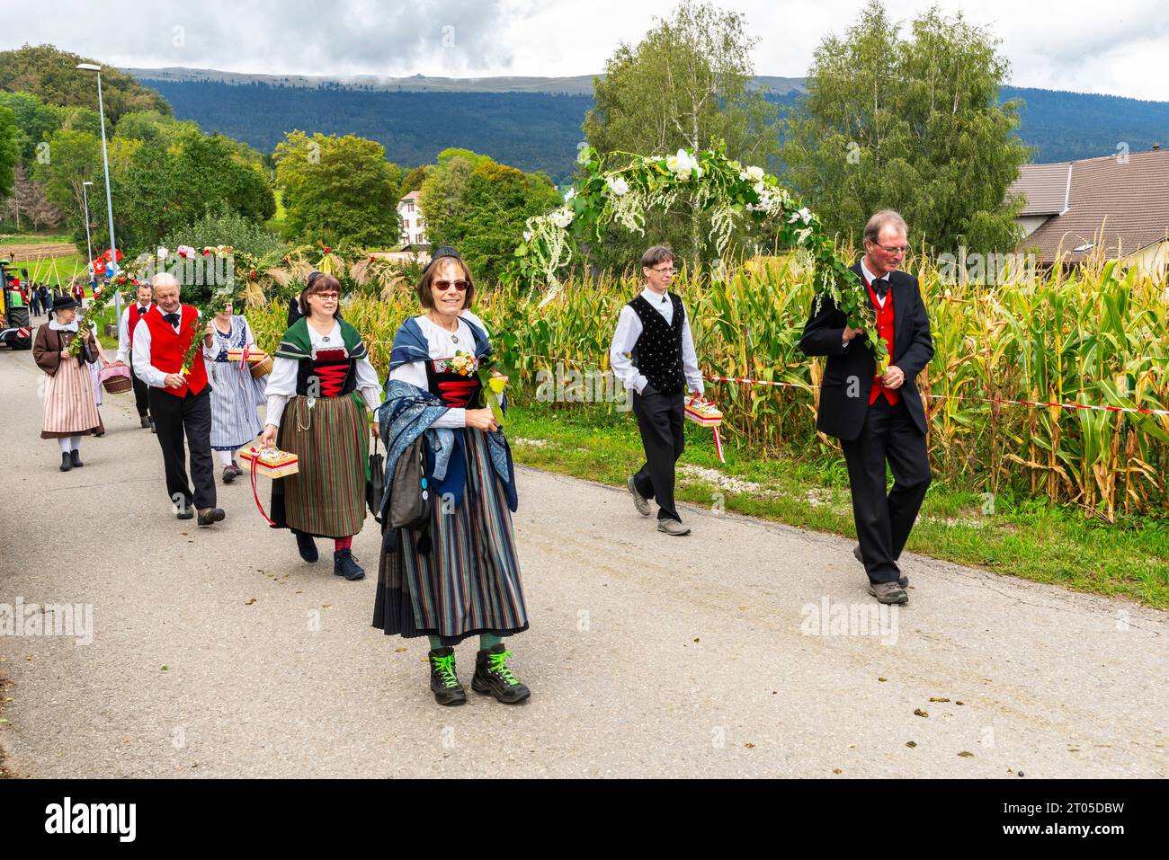 Villagers dressed in traditional costumes proudly take part in the ...