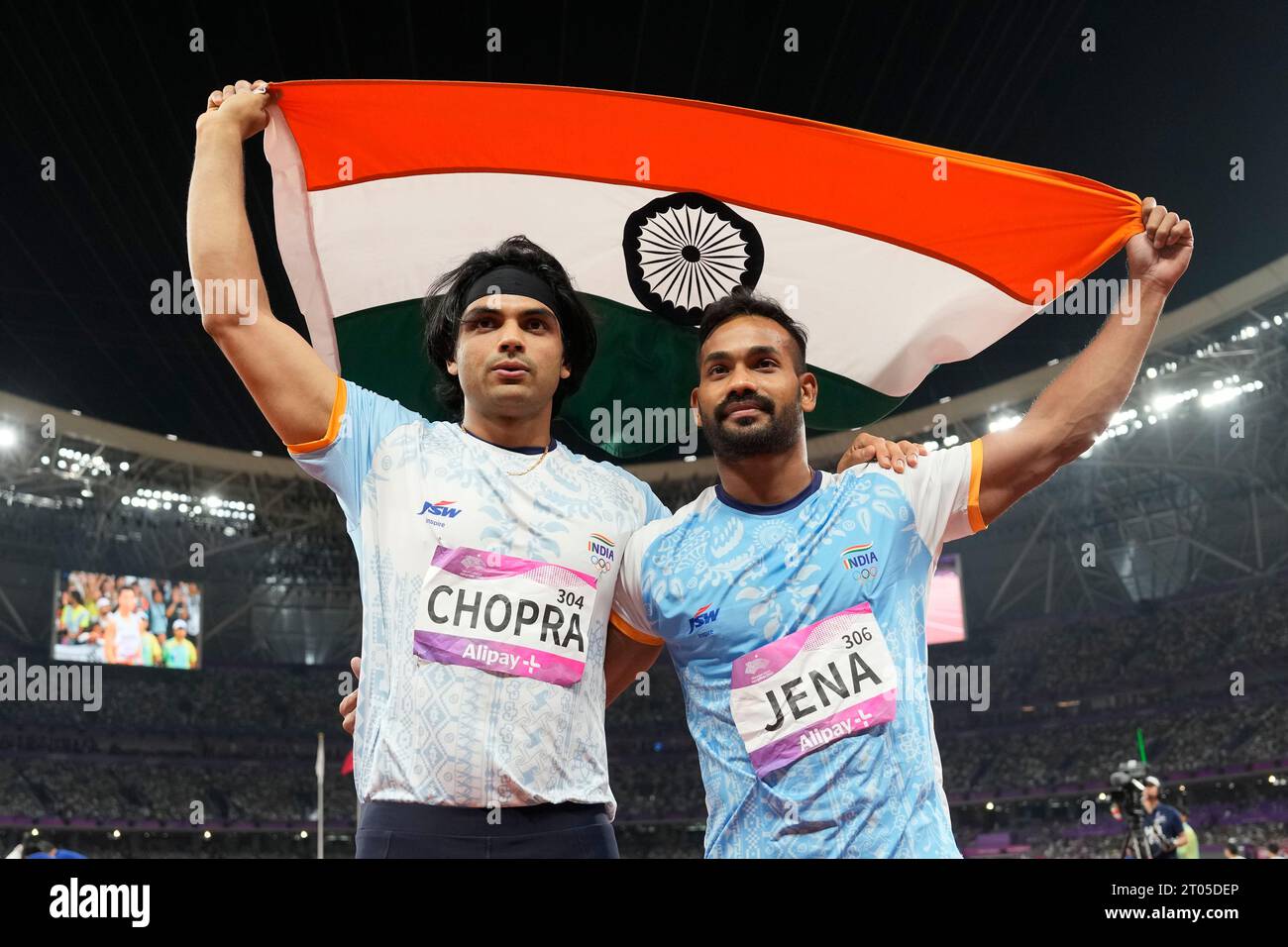 Silver medalist India's Kishore Kumar Jena, right, and gold medalist India's Neeraj Chopra ...