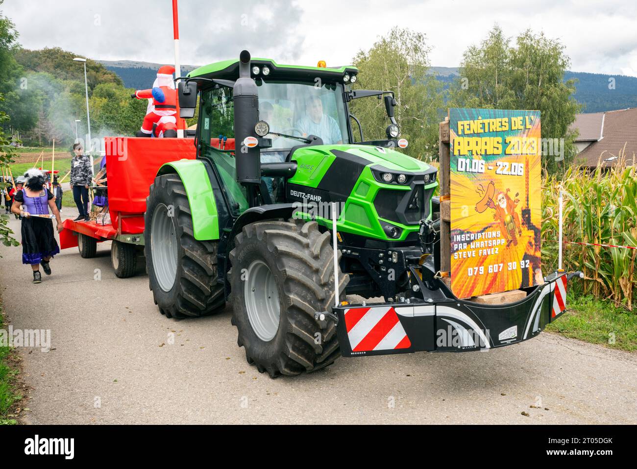 Villagers dressed in traditional costumes proudly take part in the ...