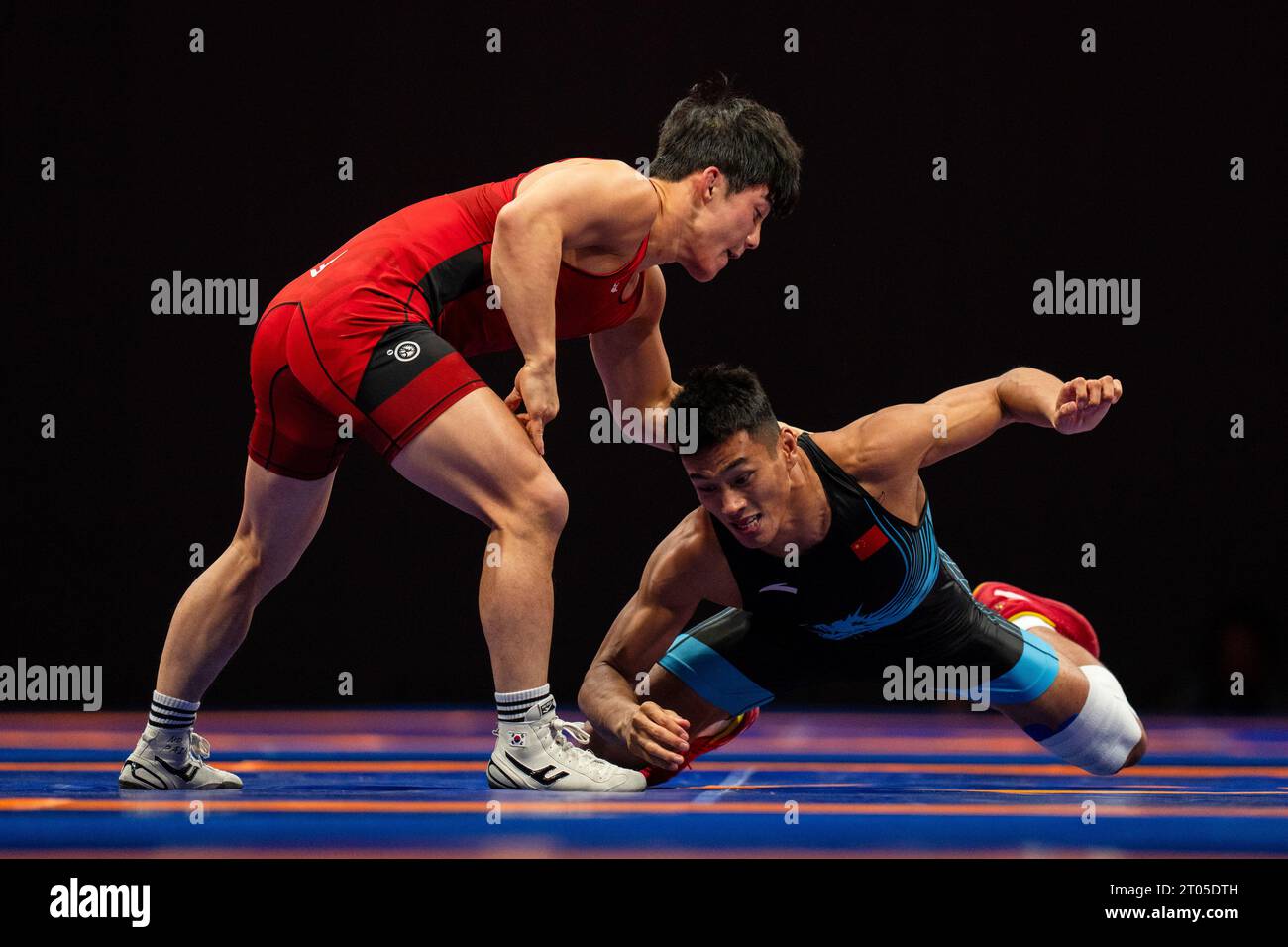 South Korea's Kim Hyeonwoo and China's Liu Rui compete during the ...