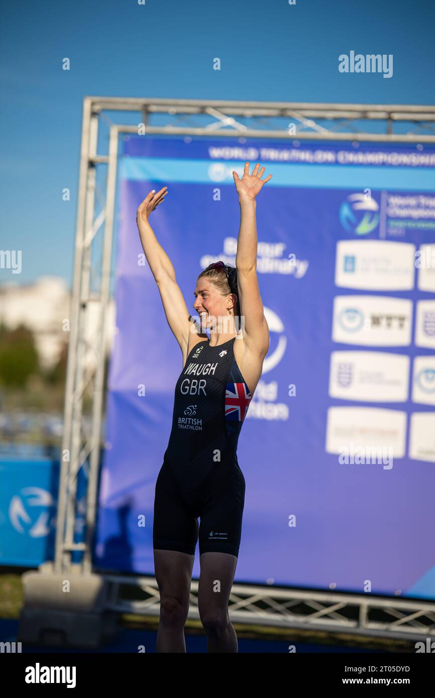 Kate Waugh on the podium with the awards ceremony in the 2023 World ...