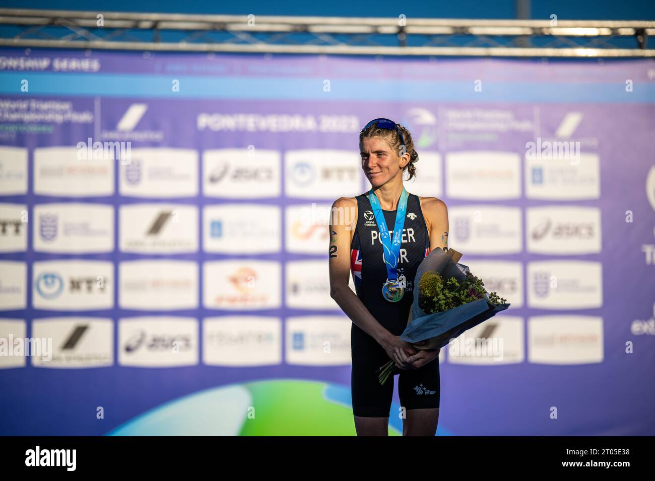 Beth Potter on the podium with the awards ceremony in the 2023 World ...